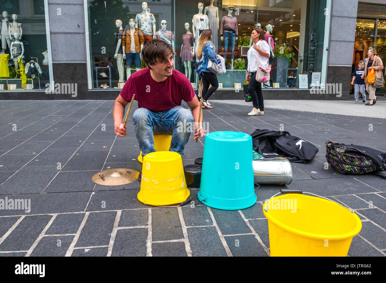 Male busking in the busy shopping streets of Liverpool using plastic ...