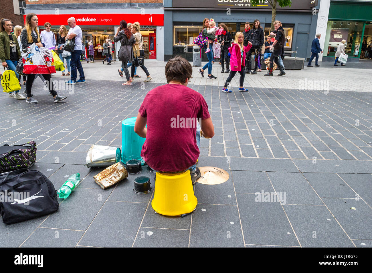 Male busking in the busy shopping streets of Liverpool using plastic ...