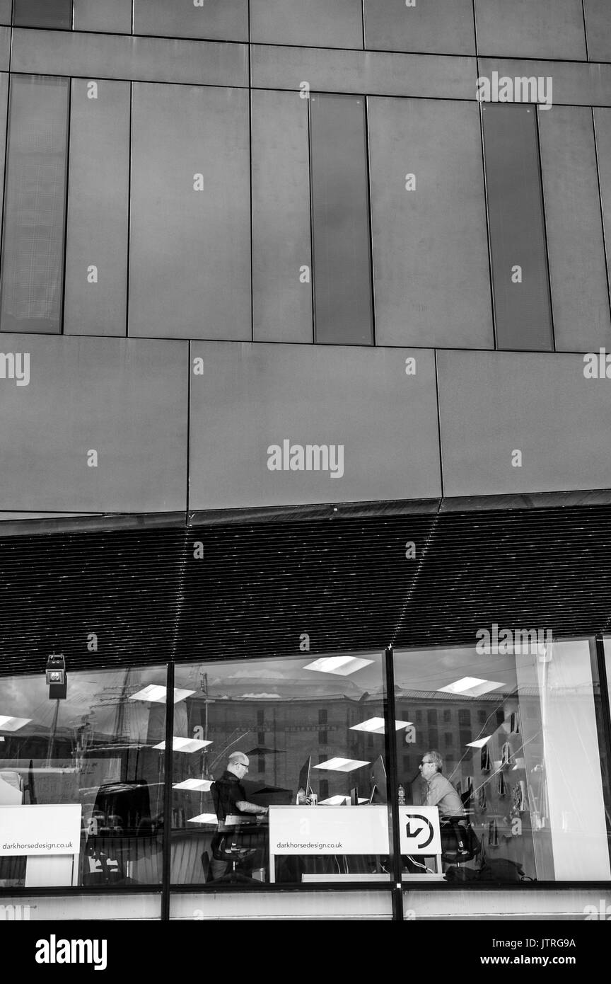 Man sitting glass desk Black and White Stock Photos & Images - Alamy