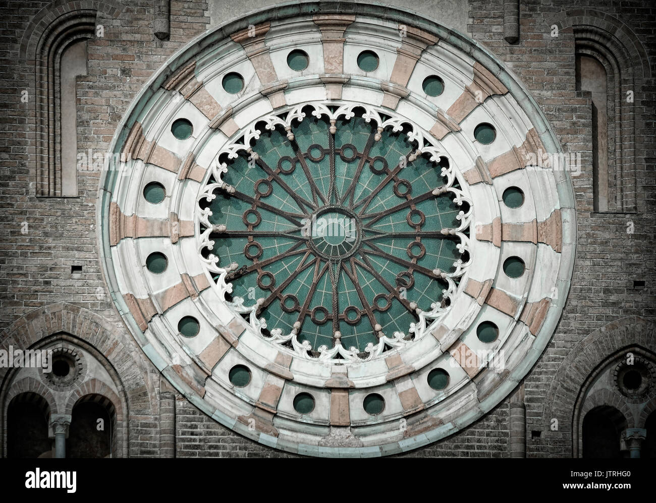Lodi (Lombardy, Italy): the medieval cathedral (Duomo), rose window on ...