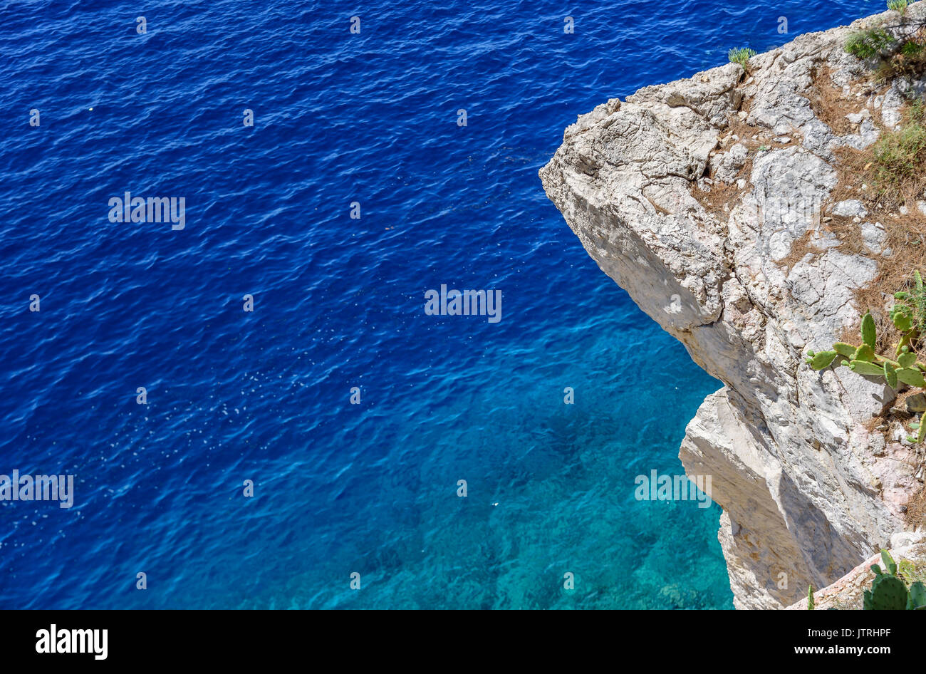 Stone ledge above the sea Stock Photo - Alamy
