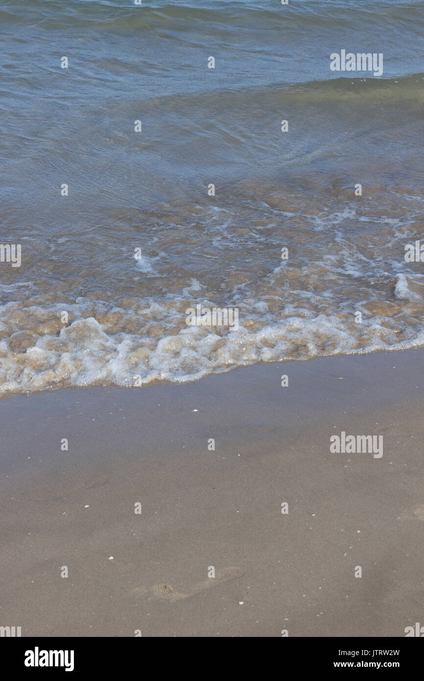 Sand on beach by ocean in summer on holiday Stock Photo - Alamy
