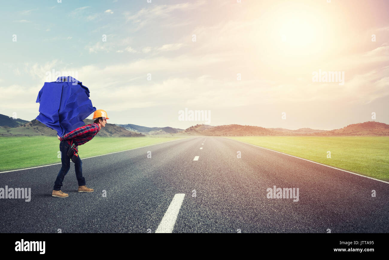 Engineer man carry load Stock Photo - Alamy