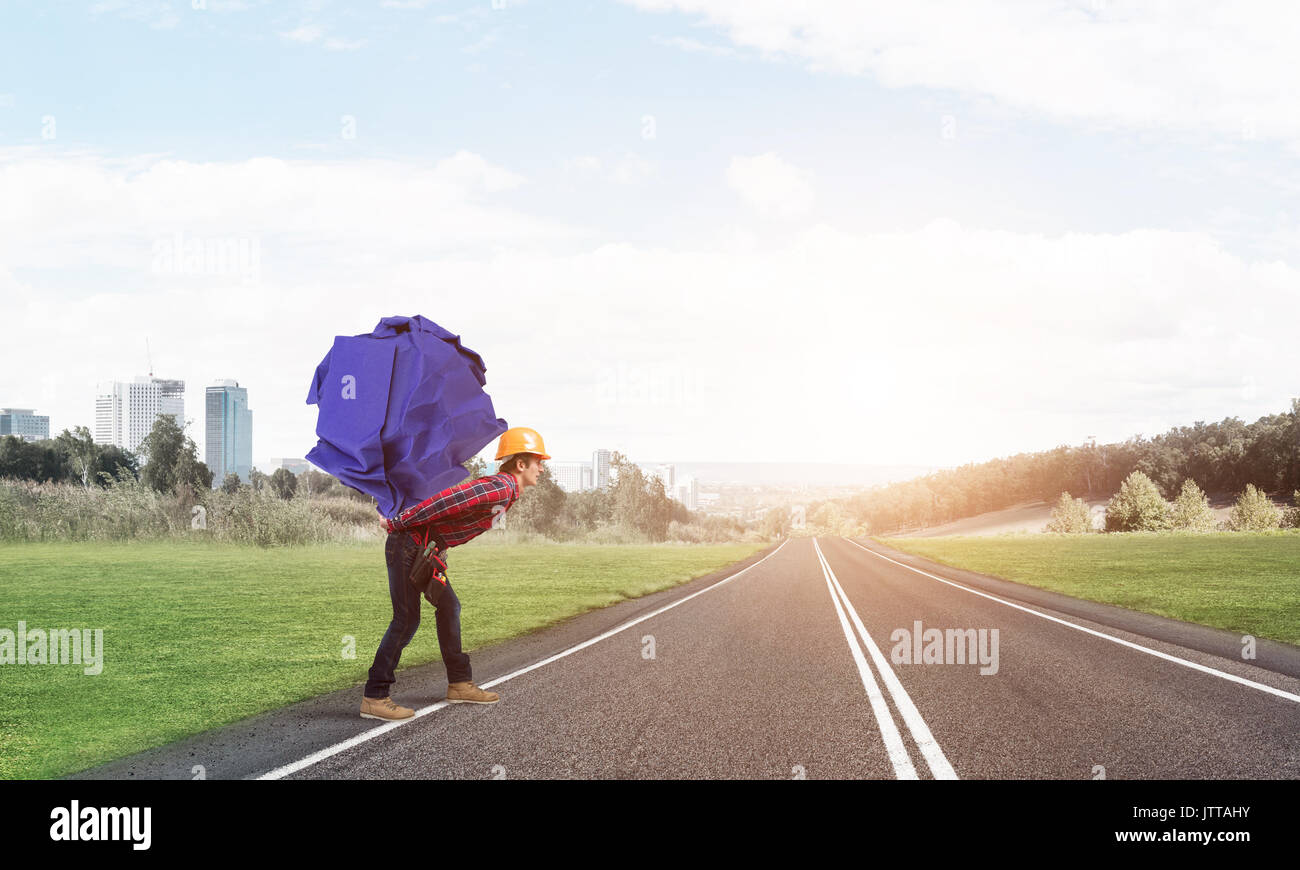 Engineer man carry load Stock Photo - Alamy