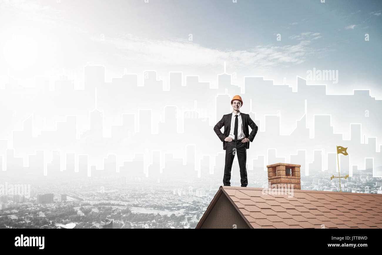 Man standing edge roof hi-res stock photography and images - Alamy
