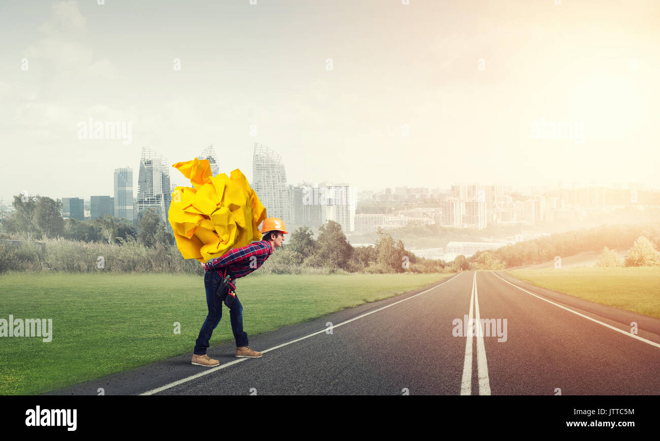 Engineer man carry load Stock Photo - Alamy
