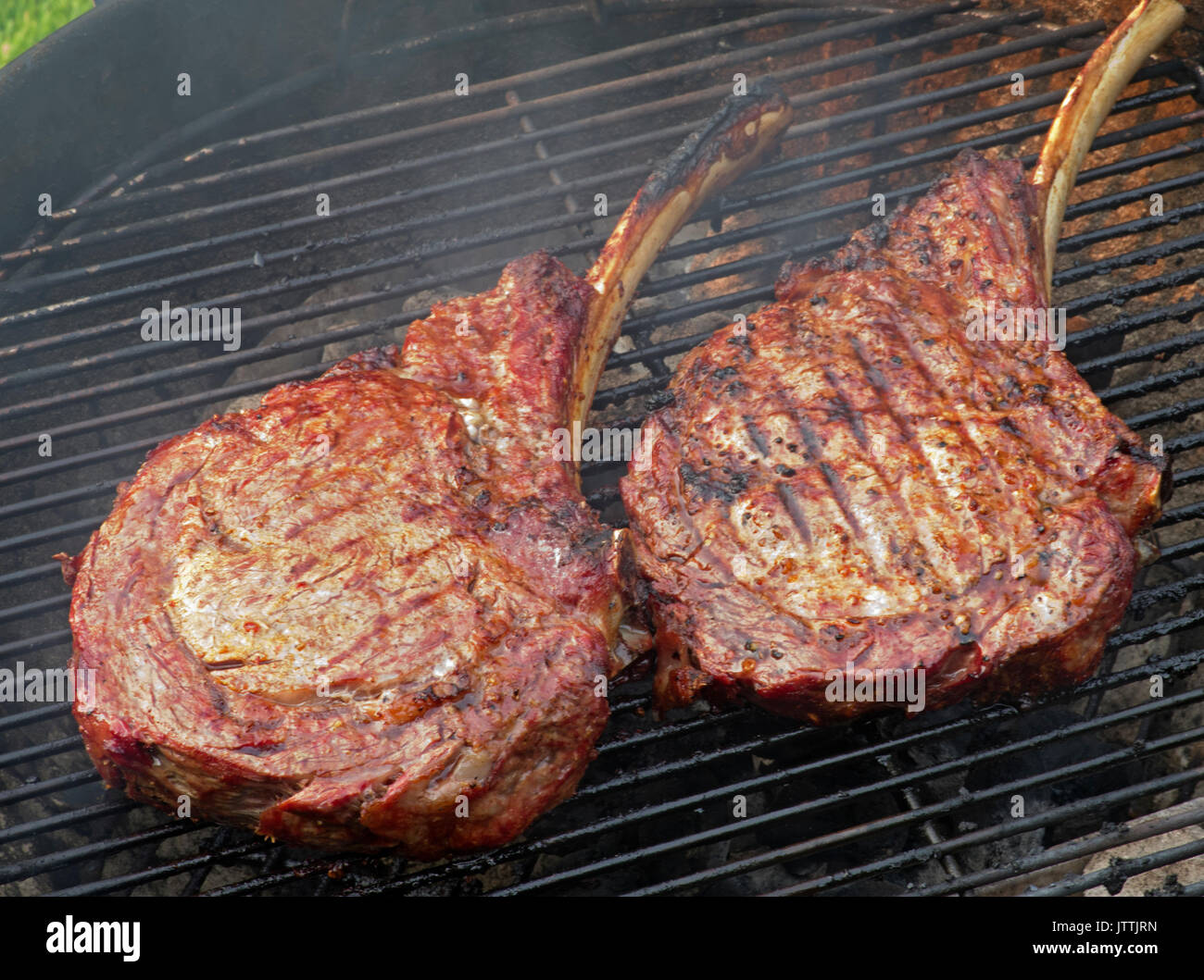 Tomahawk steaks hi-res stock photography and images - Alamy