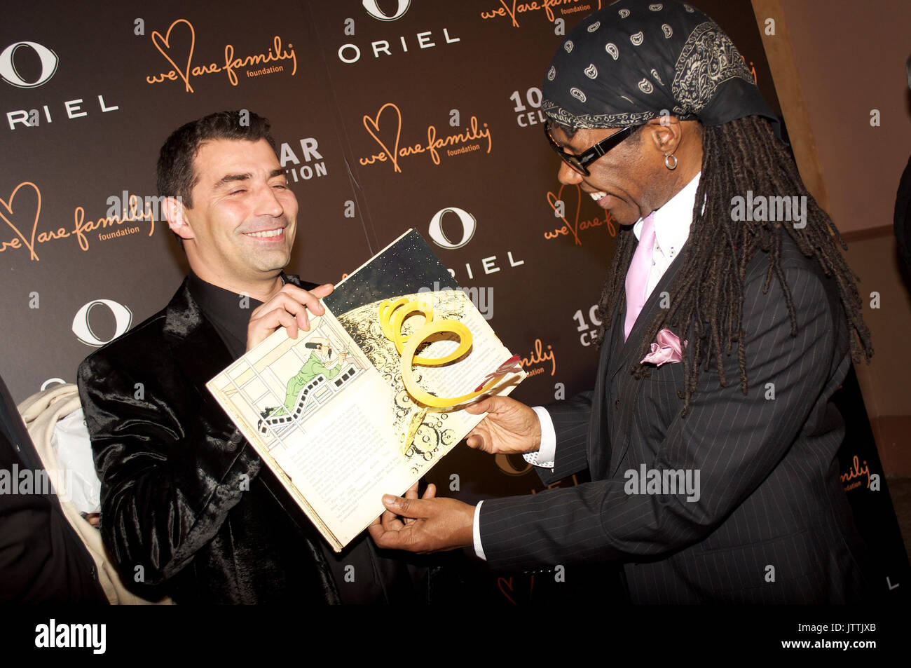 Nile Rodgers with guest at the 10th Annual We Are Family Foundation ...