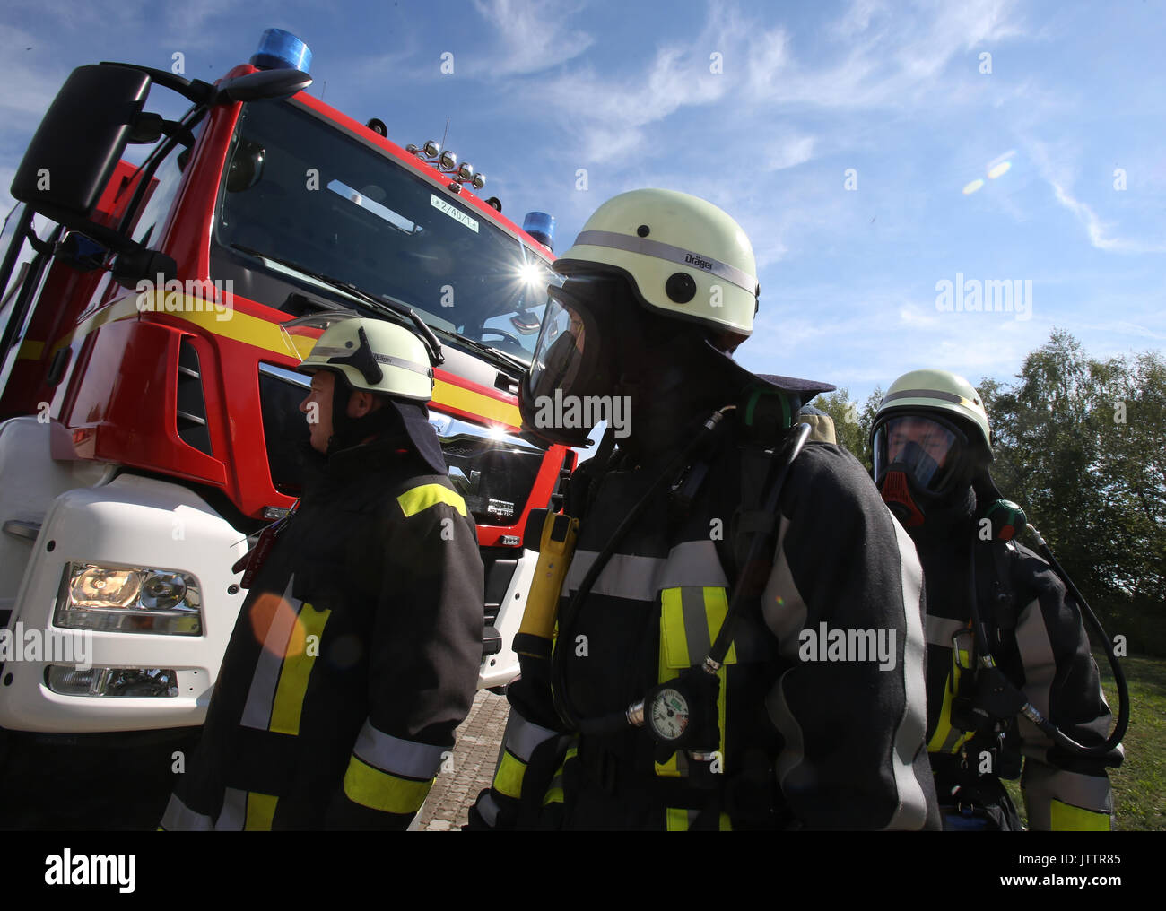 Munich, Germany. 7th July, 2017. Firefighters in action during a mock ...