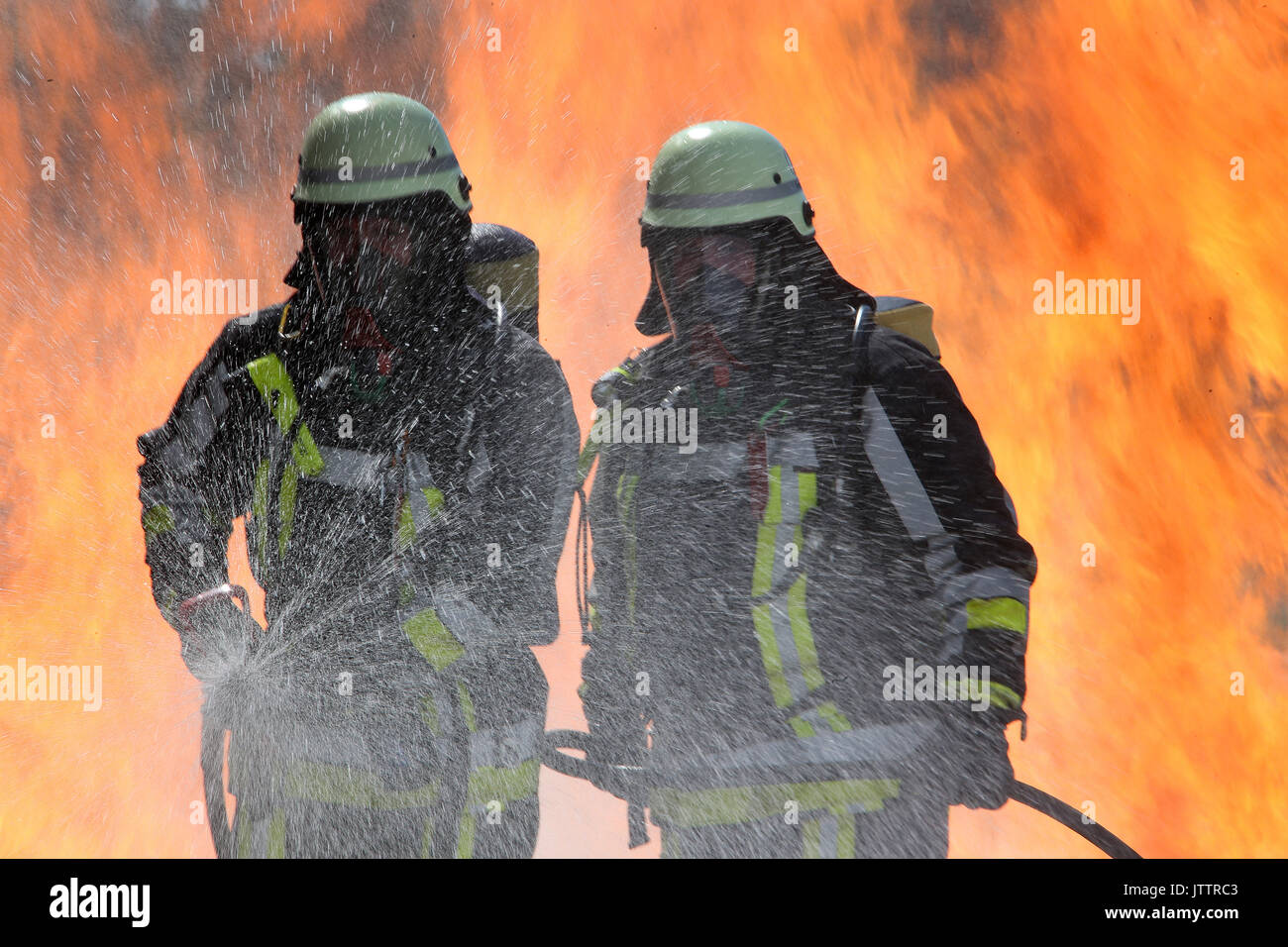 Munich, Germany. 7th July, 2017. Firefighters in action during a mock ...