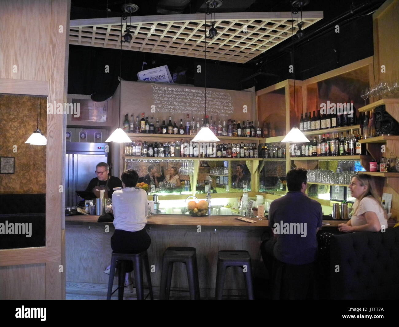 New York, USA. 7th Aug, 2017. Customers have a drink in the Coup bar in ...