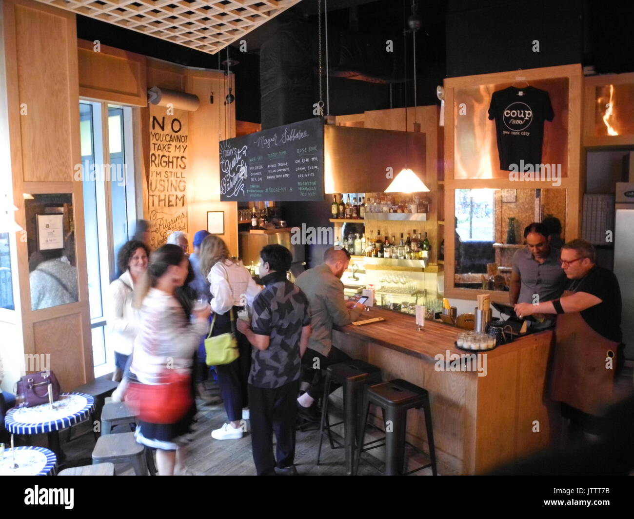 New York, USA. 7th Aug, 2017. Customers have a drink in the Coup bar in ...