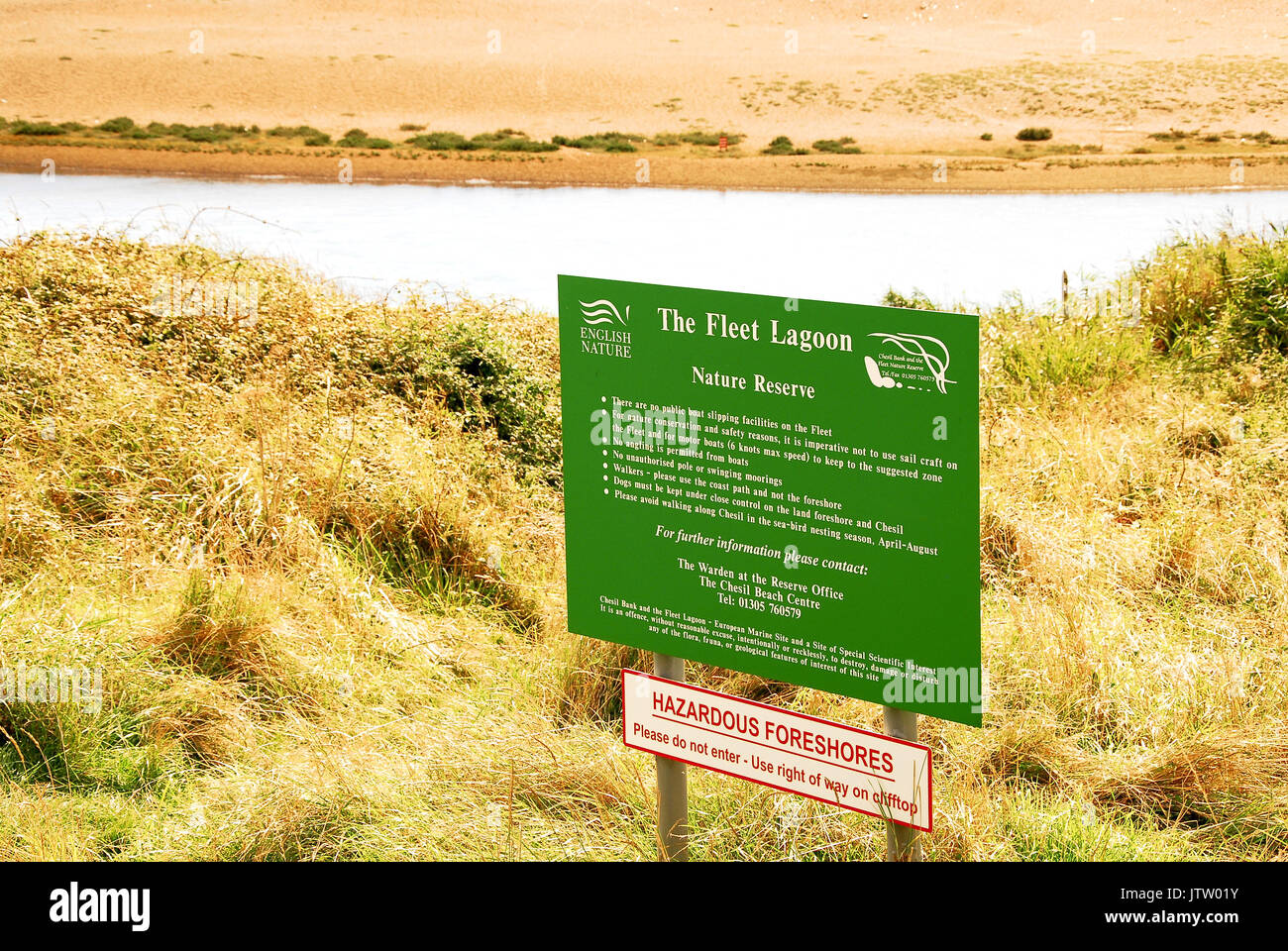 A sign-board explaining the rules of the Fleet Lagoon Nature Reserve ...