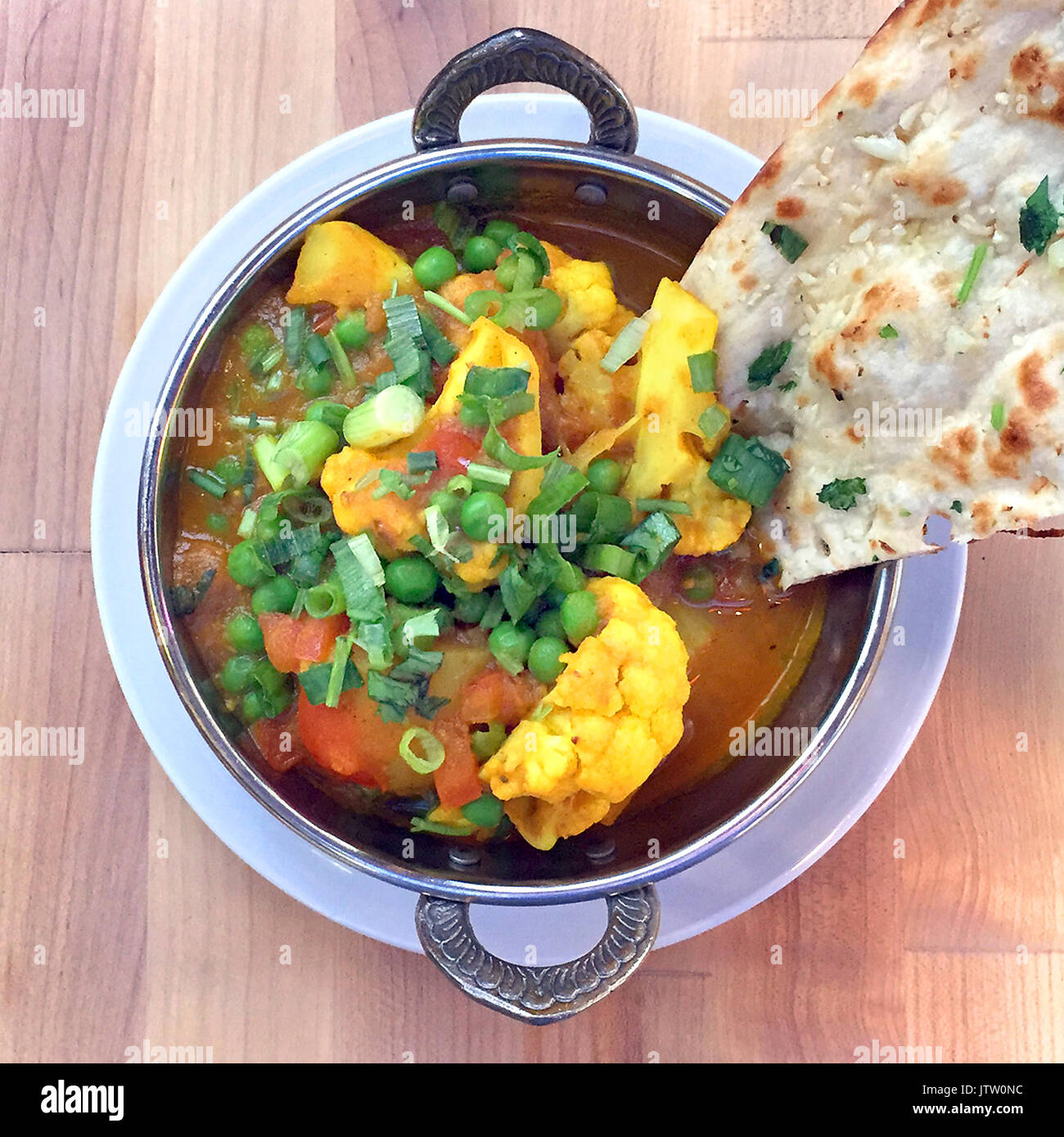 Napa, CA, USA. 7th Aug, 2017. Alu cauli kerau with garlic, cilantro ...