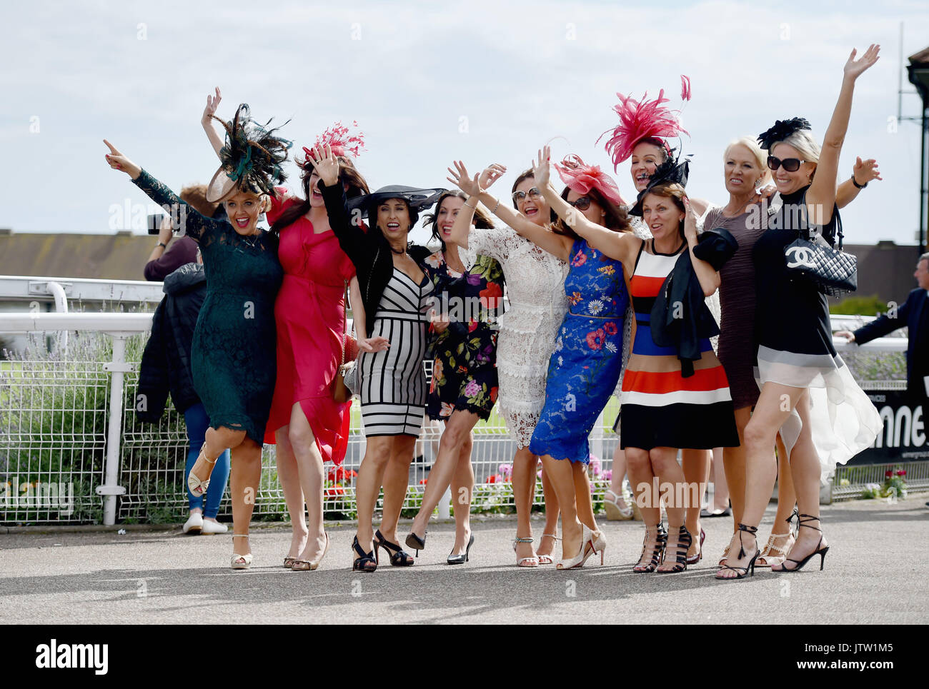 Brighton, UK. 10th Aug, 2017. Racegoers enjoying themselves at Brighton ...