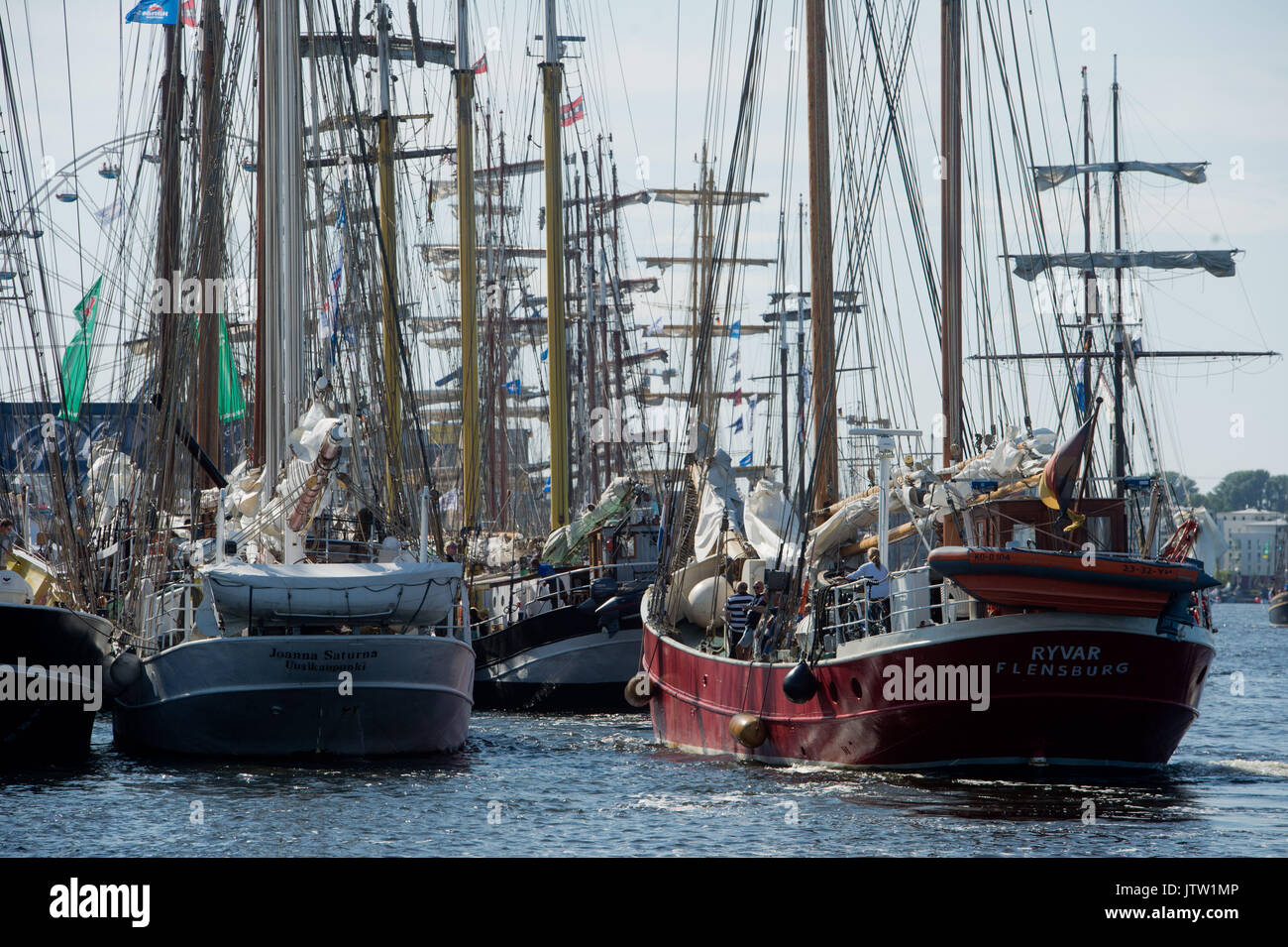 Rostock, Germany. 10th Aug, 2017. Historical sailing ships are lying at ...