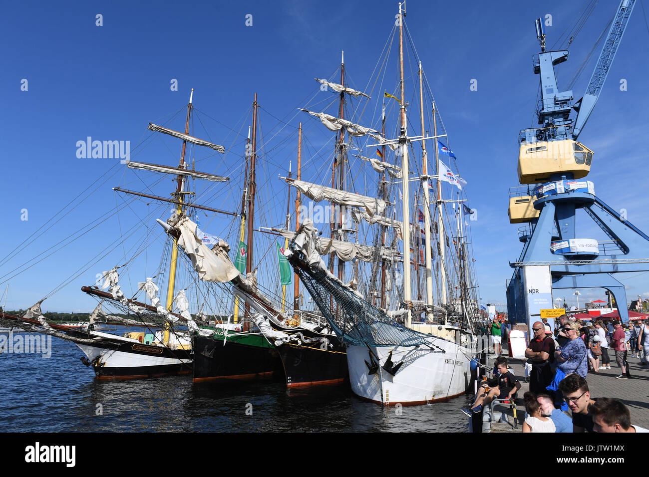 Rostock, Germany. 10th Aug, 2017. Historical sailing ships are lying at ...