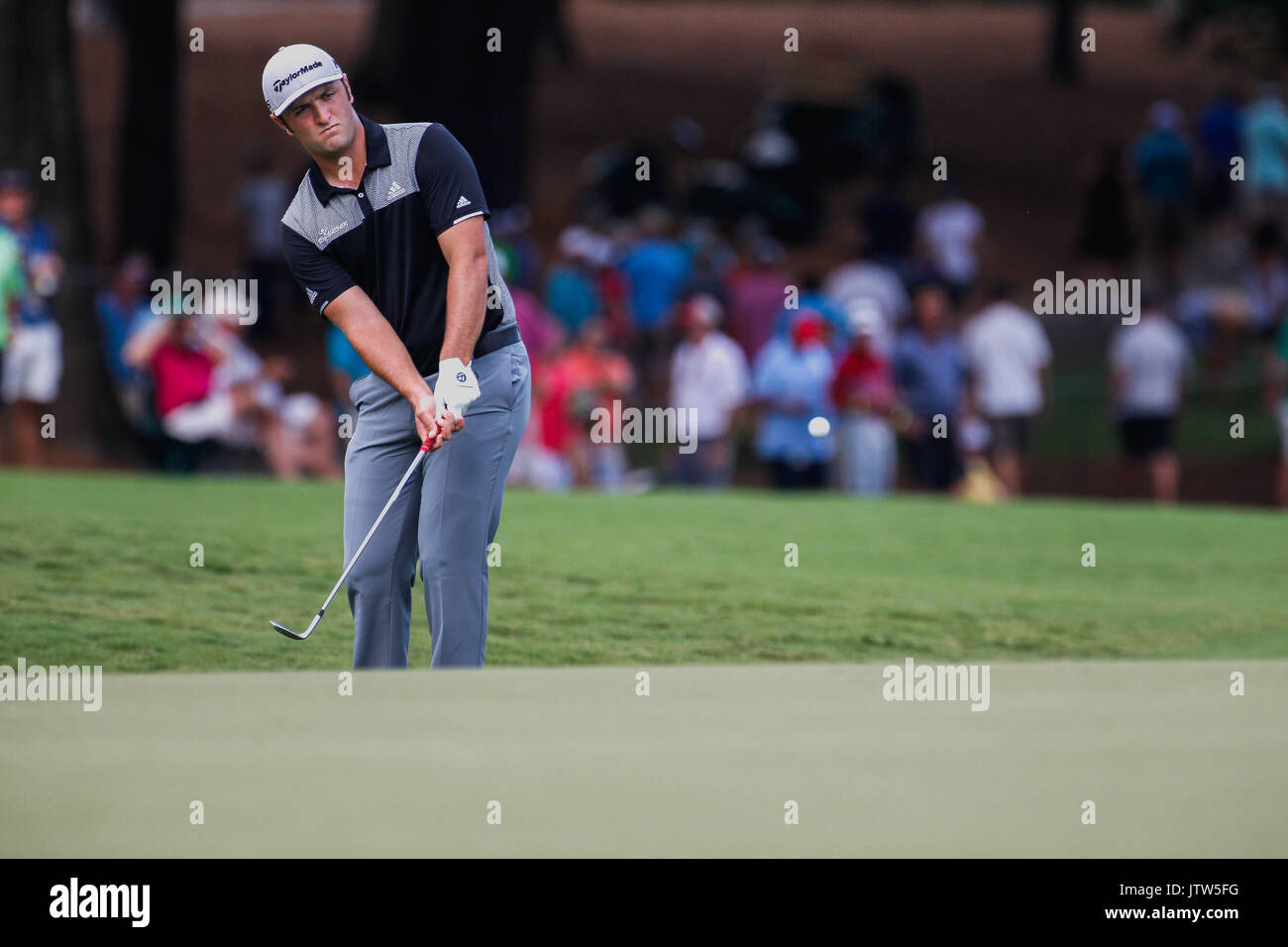 Charlotte, North Carolina, USA. 10th Aug, 2017. Jon Rahm of Spain chips ...