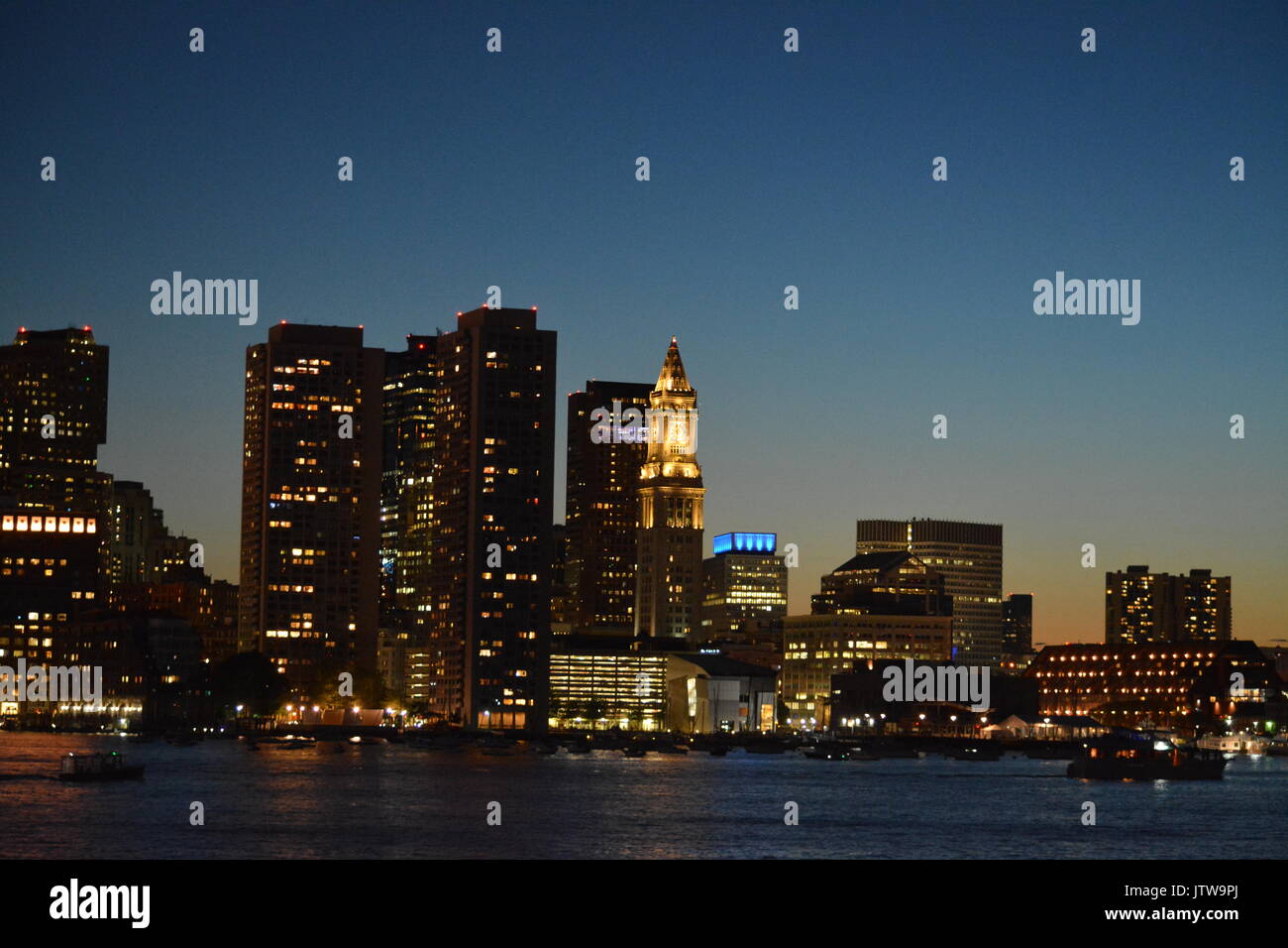 The Boston skyline seen from Boston Harbor at sunset Stock Photo - Alamy