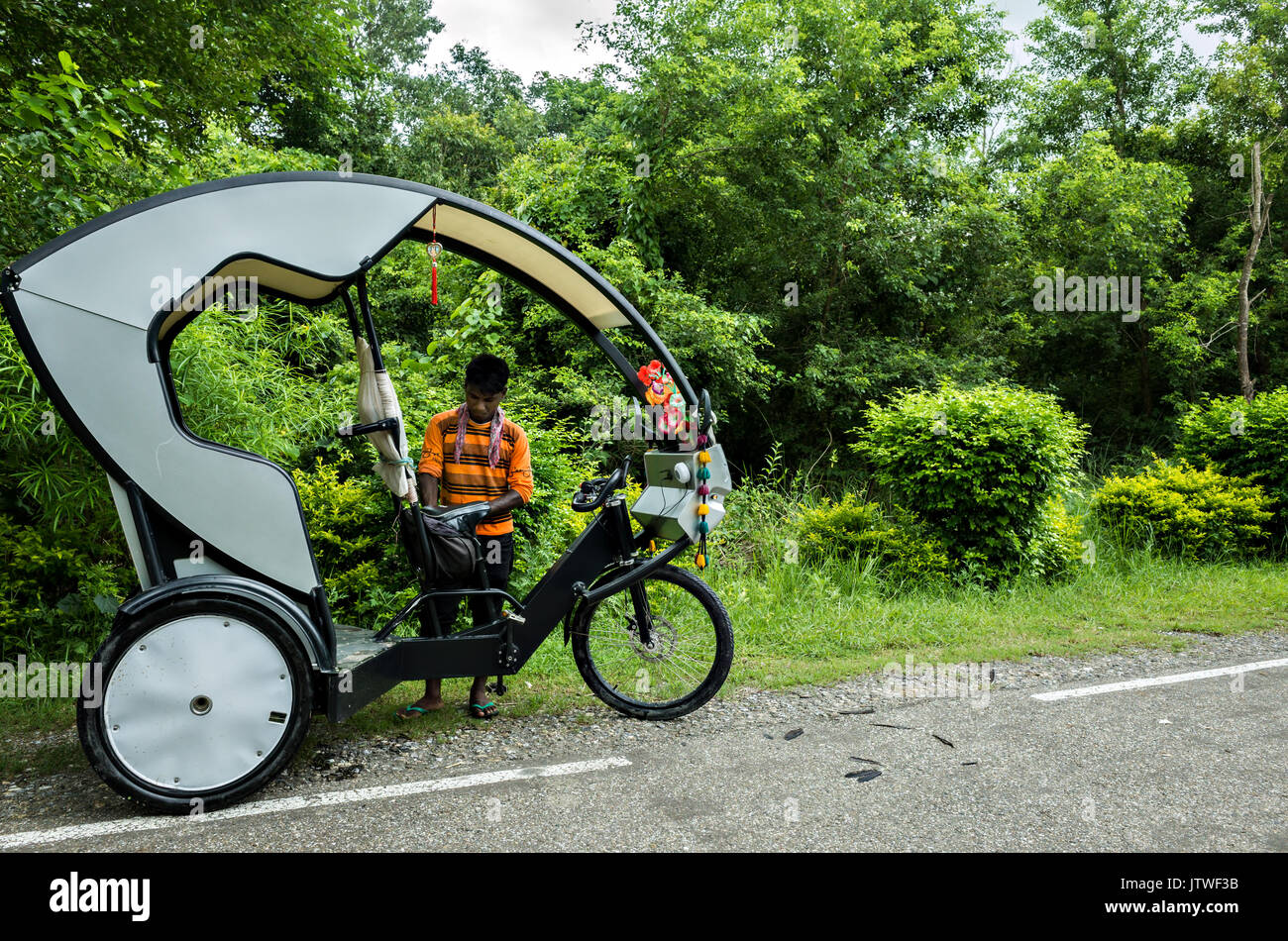 a rickshaw man waiting for passengers in Lumbini, Nepal Stock Photo - Alamy