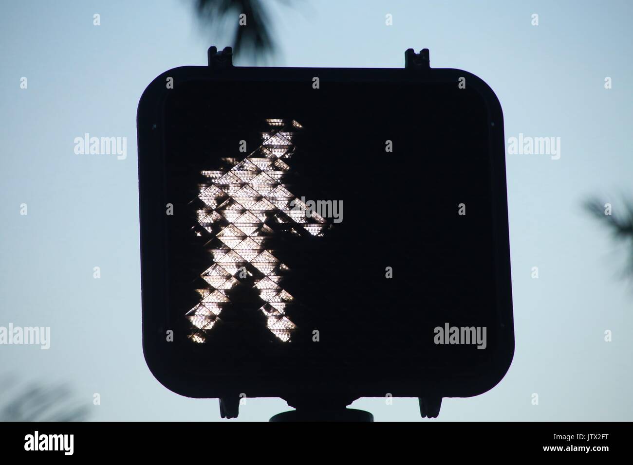 White Illuminated Walk Pedestrian Crossing Signal at Traffic ...