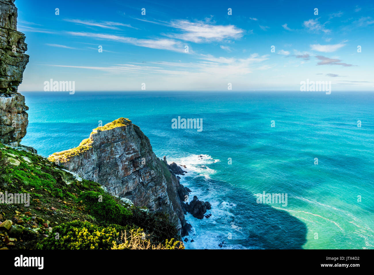 Rugged rocks and steep cliffs of Cape Point in the Cape of Good Hope ...