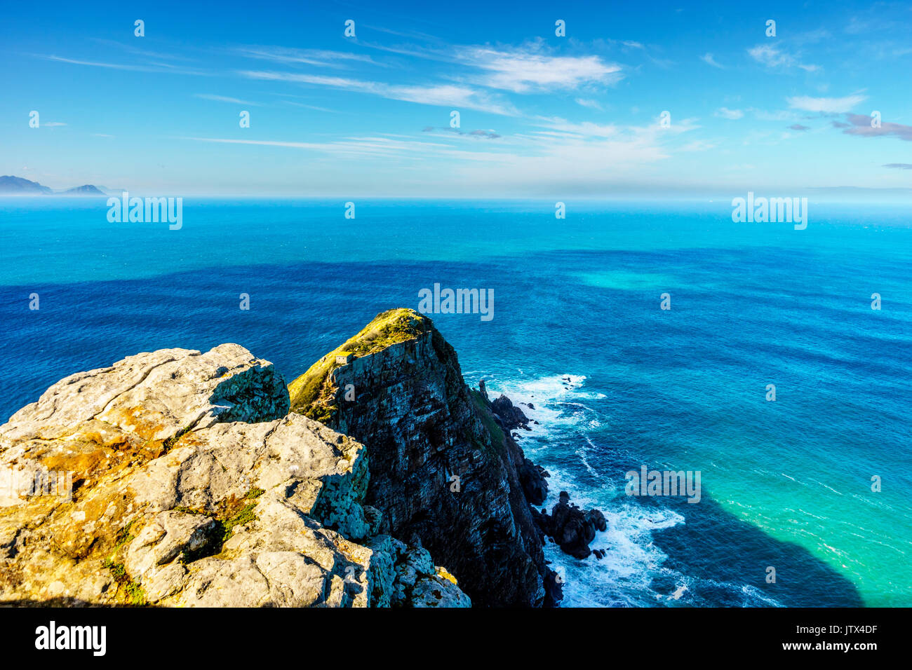 Rugged rocks and steep cliffs of Cape Point in the Cape of Good Hope ...