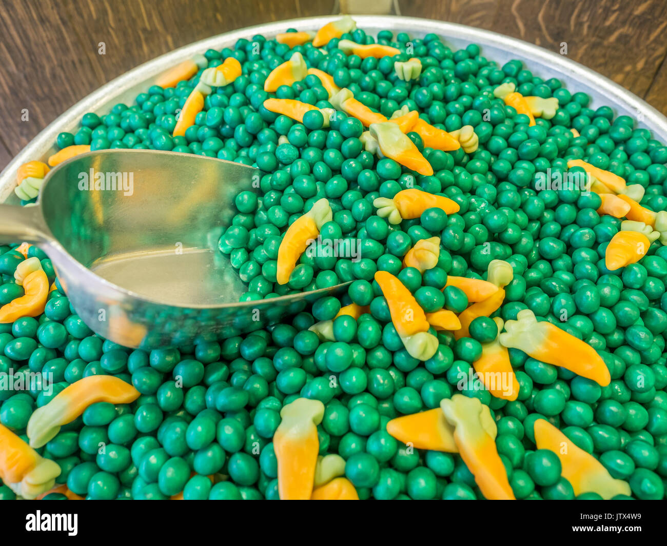 Colorful candy in large barrel Stock Photo - Alamy