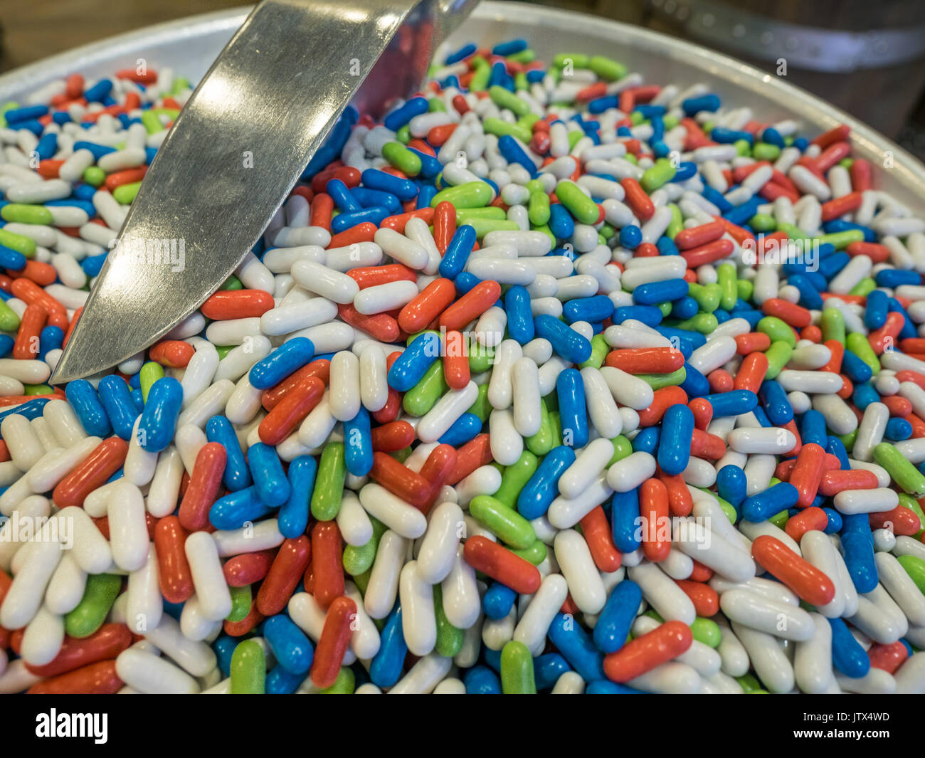 Colorful candy in large barrel Stock Photo - Alamy
