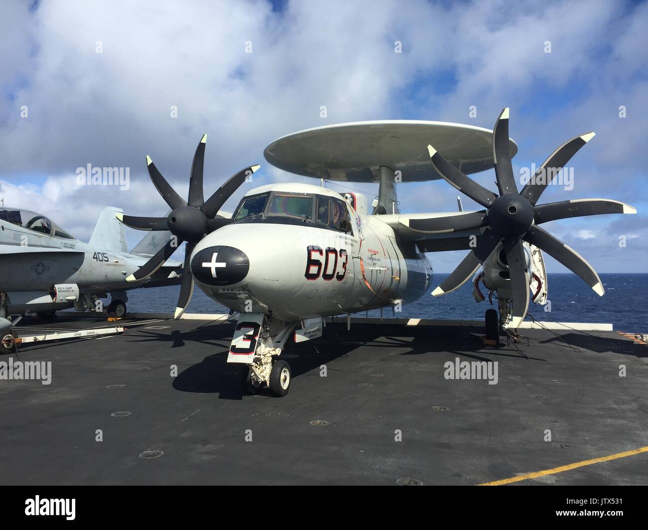 A Hawkeye jet on the flight deck of the US Navy Nimitz-class aircraft ...