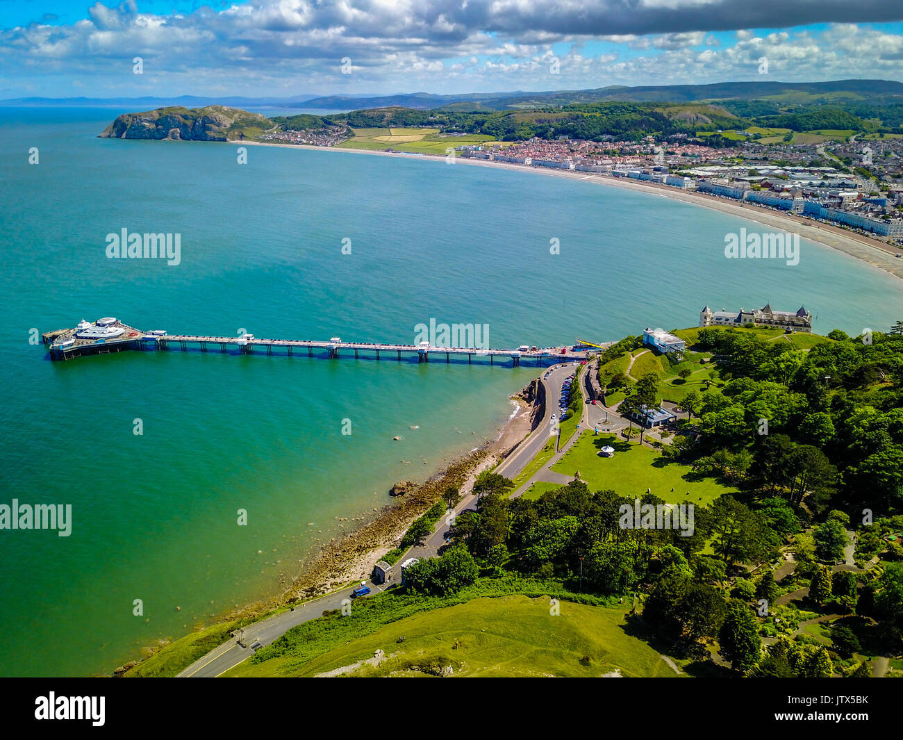 Llandudno Victorian town and pier in North Wales showing the beach and ...