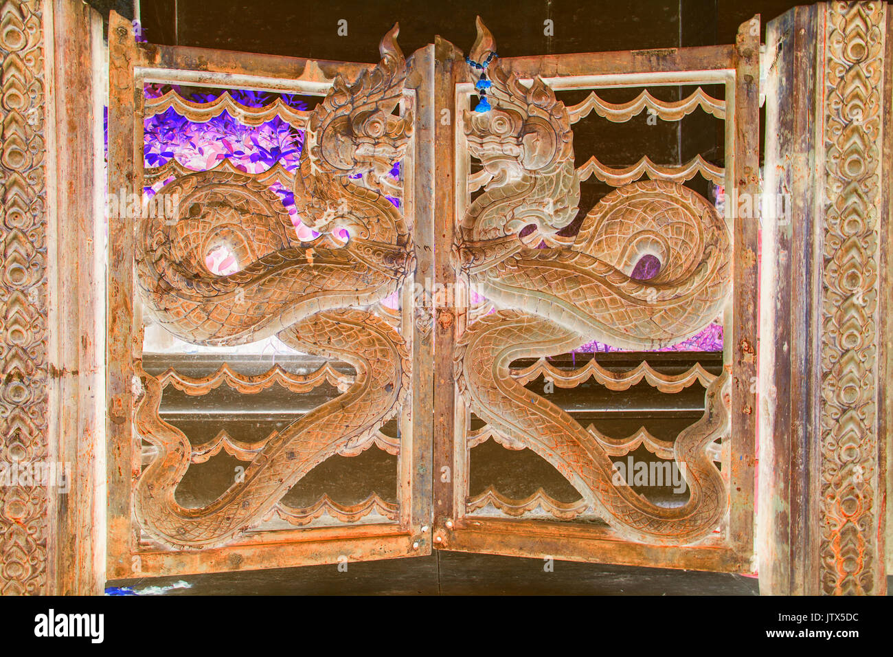 Negative Image of Naga Heads Thai-Style Metal Art on a Door Gate Stock ...