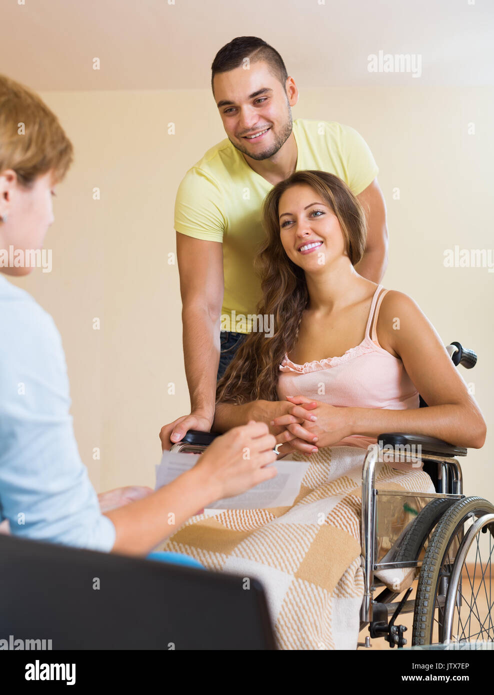 Disabled person talking to family hi-res stock photography and images ...