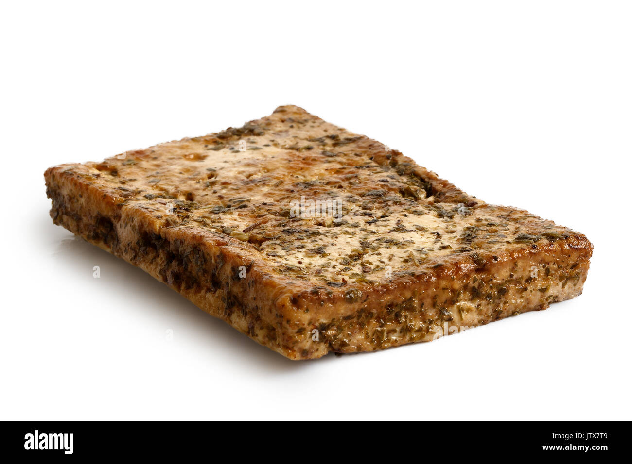 Single block of marinated tofu with herbs isolated on white Stock Photo ...