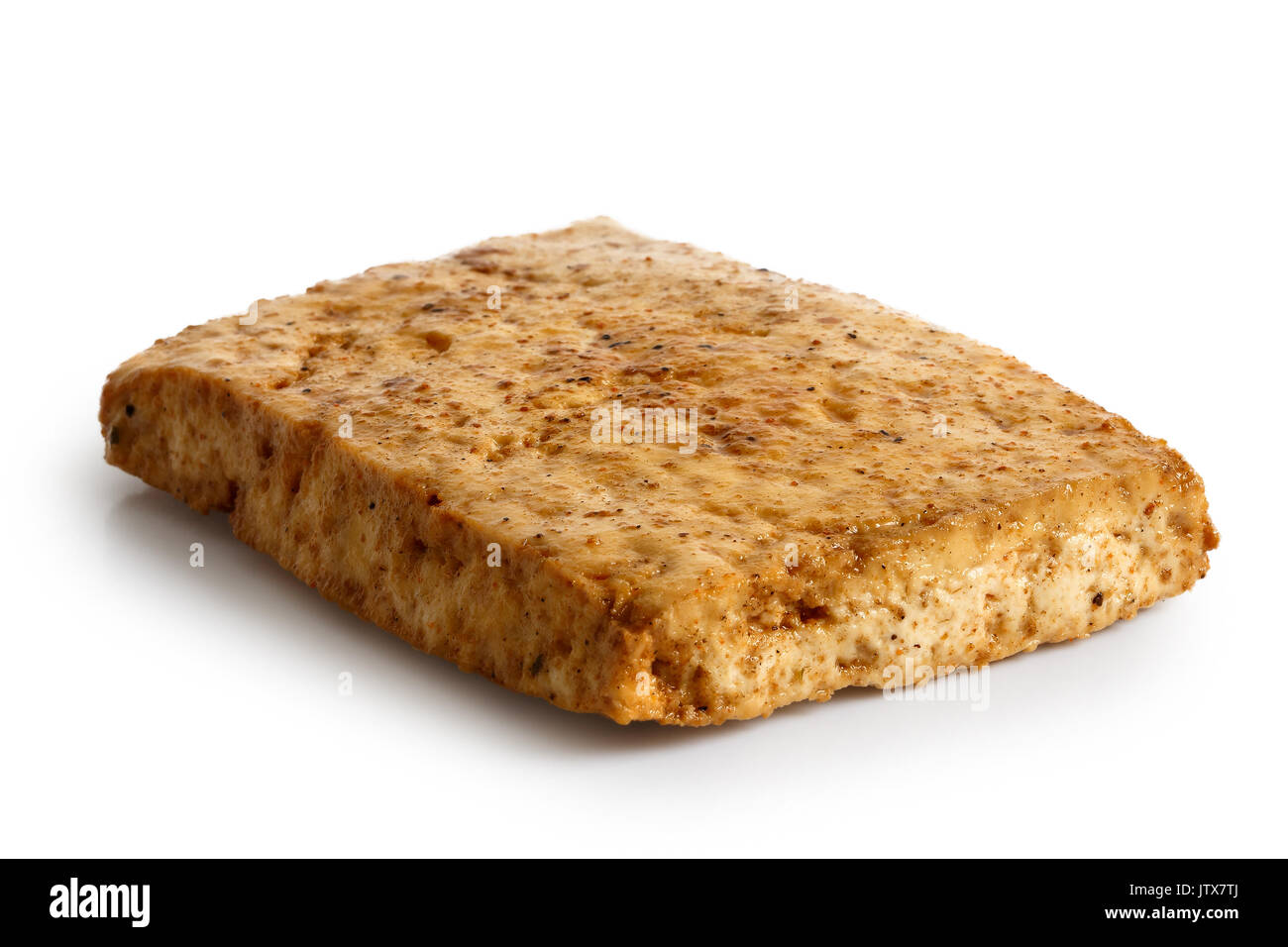 Single block of marinated tofu isolated on white Stock Photo - Alamy