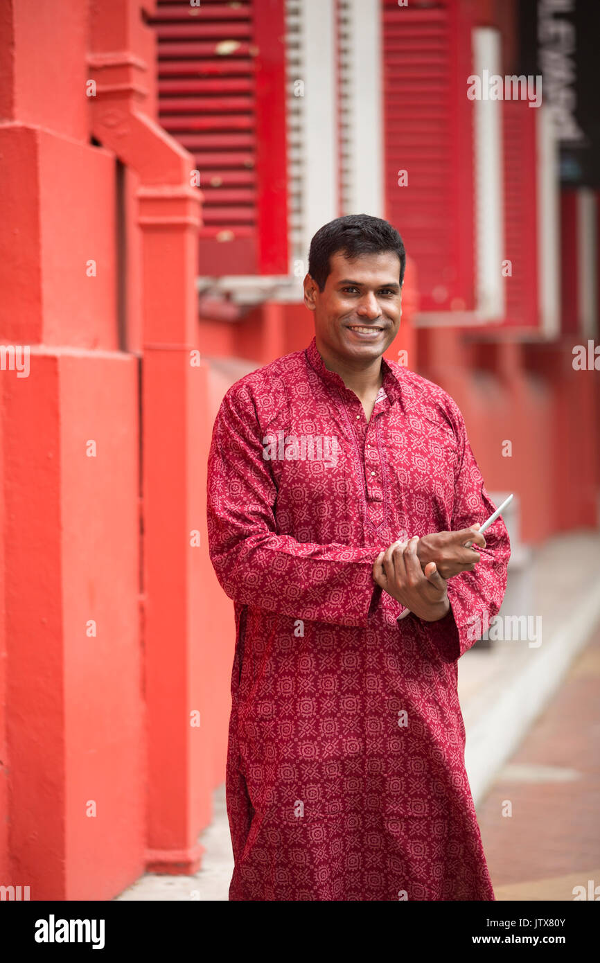 Happy indian man outdoors. portrait of an indian man wearing a ...