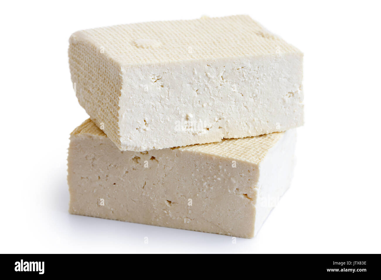 Two blocks of white tofu isolated on white Stock Photo - Alamy