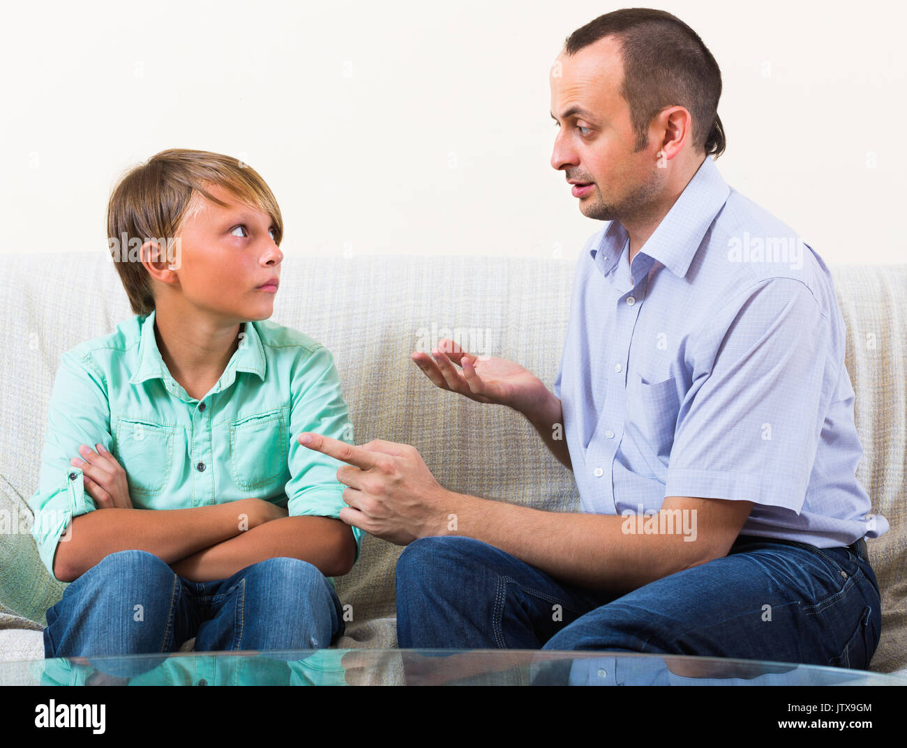 Father son talking serious hi-res stock photography and images - Alamy
