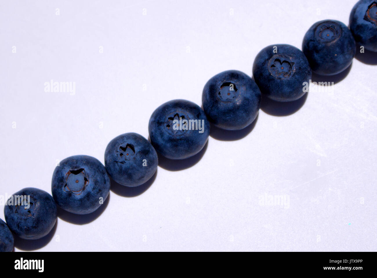 Blueberry. Close-up view of fresh Blueberries isolated on white ...