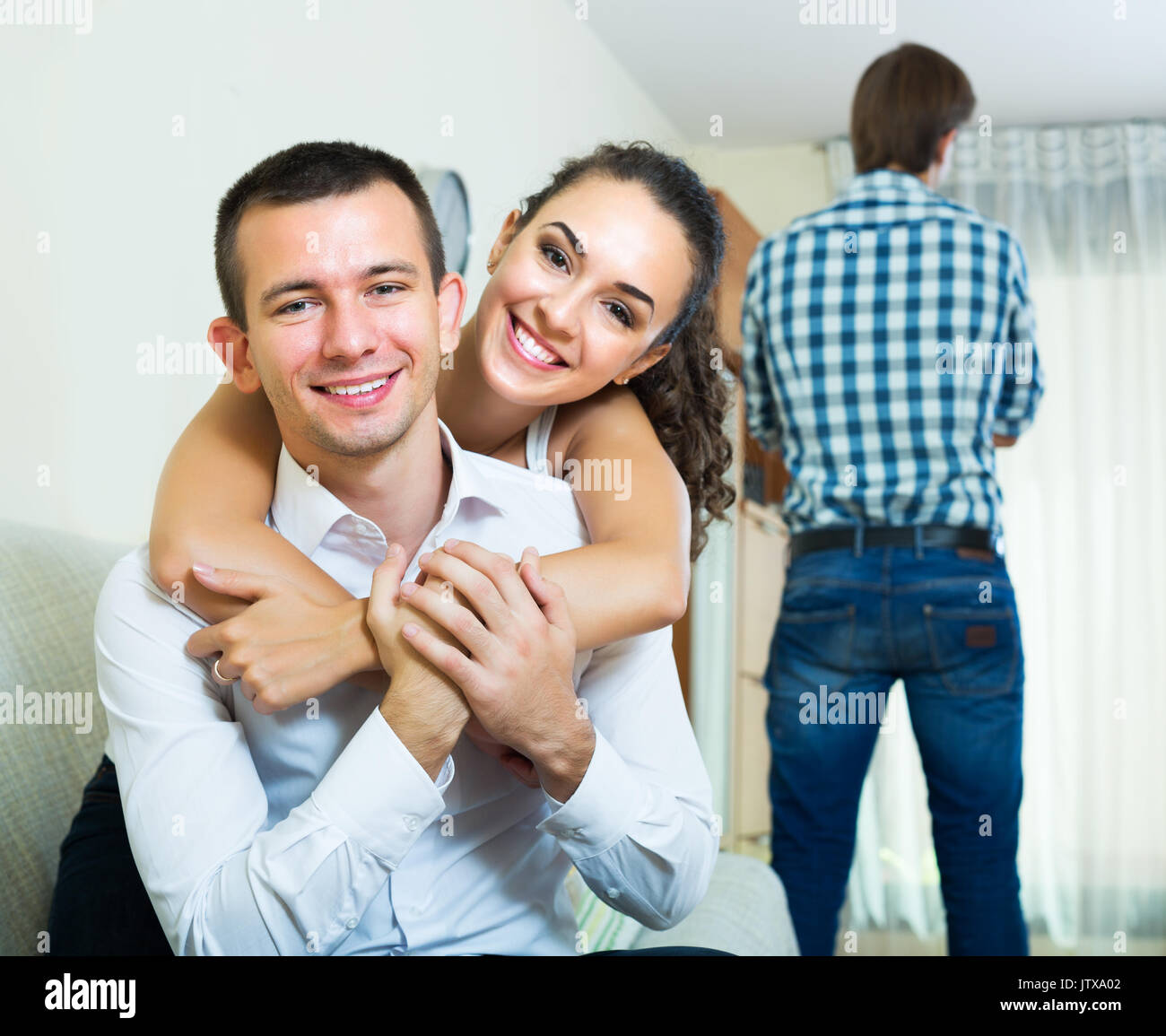 Unhappy ex-lover watching happy girlfriend leaving him for another man ...