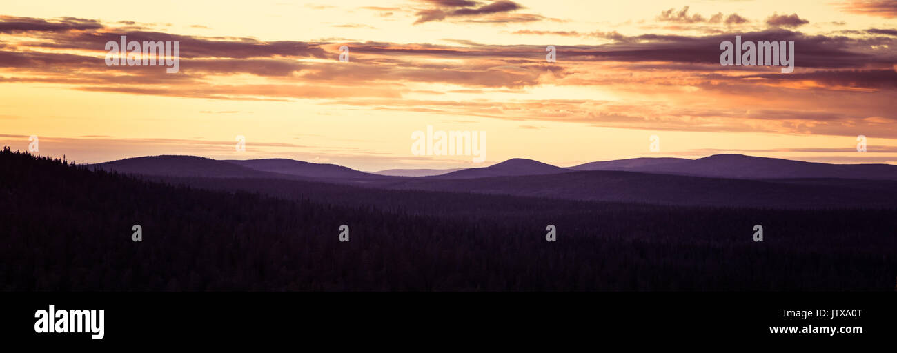 A beautiful landscape with a midnight sun above arctic circle. Dreamy ...