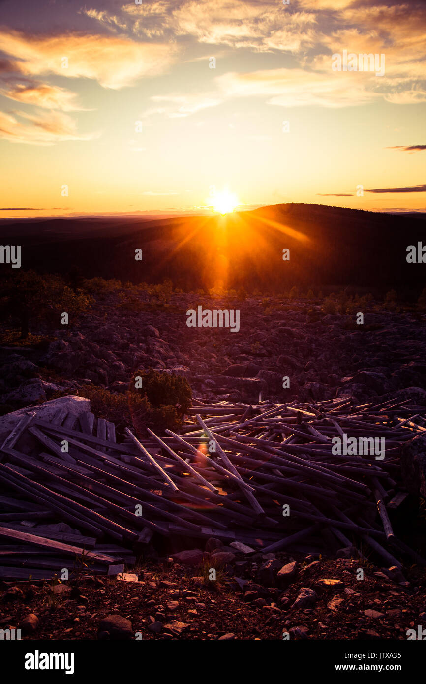 A beautiful landscape with a midnight sun above arctic circle. Dreamy ...
