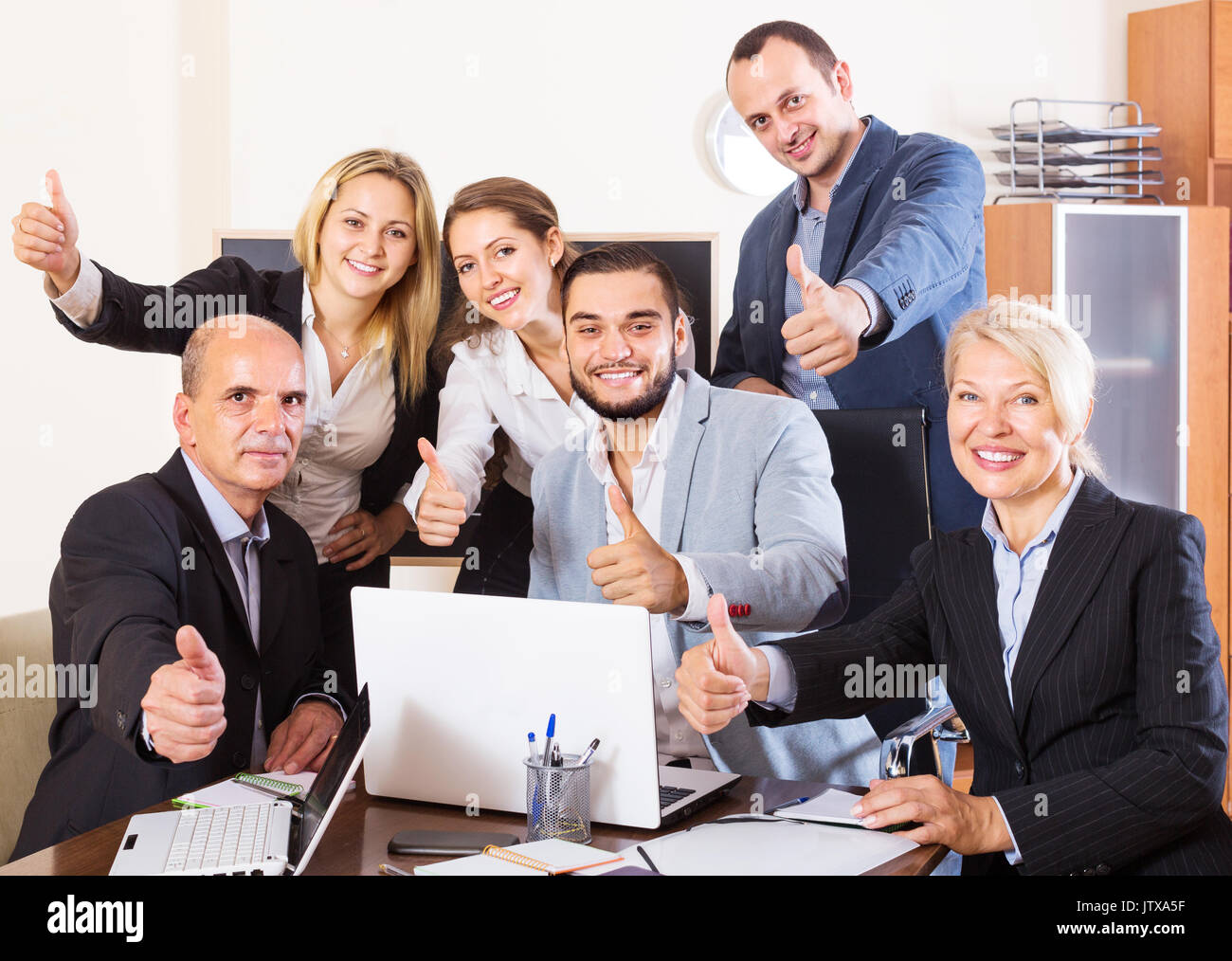 Relaxed employees hi-res stock photography and images - Alamy