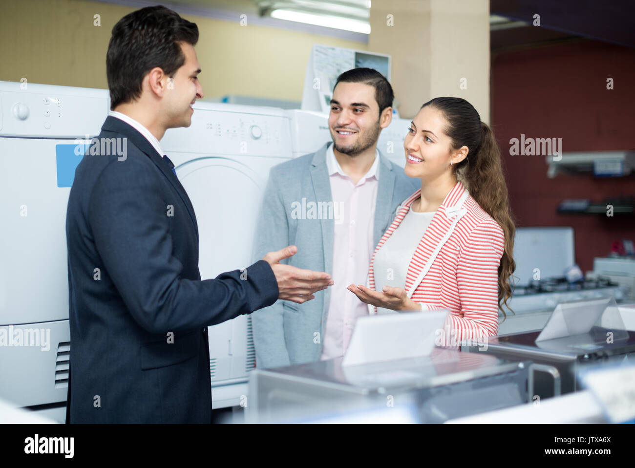 Indian salesman in store hi-res stock photography and images - Alamy