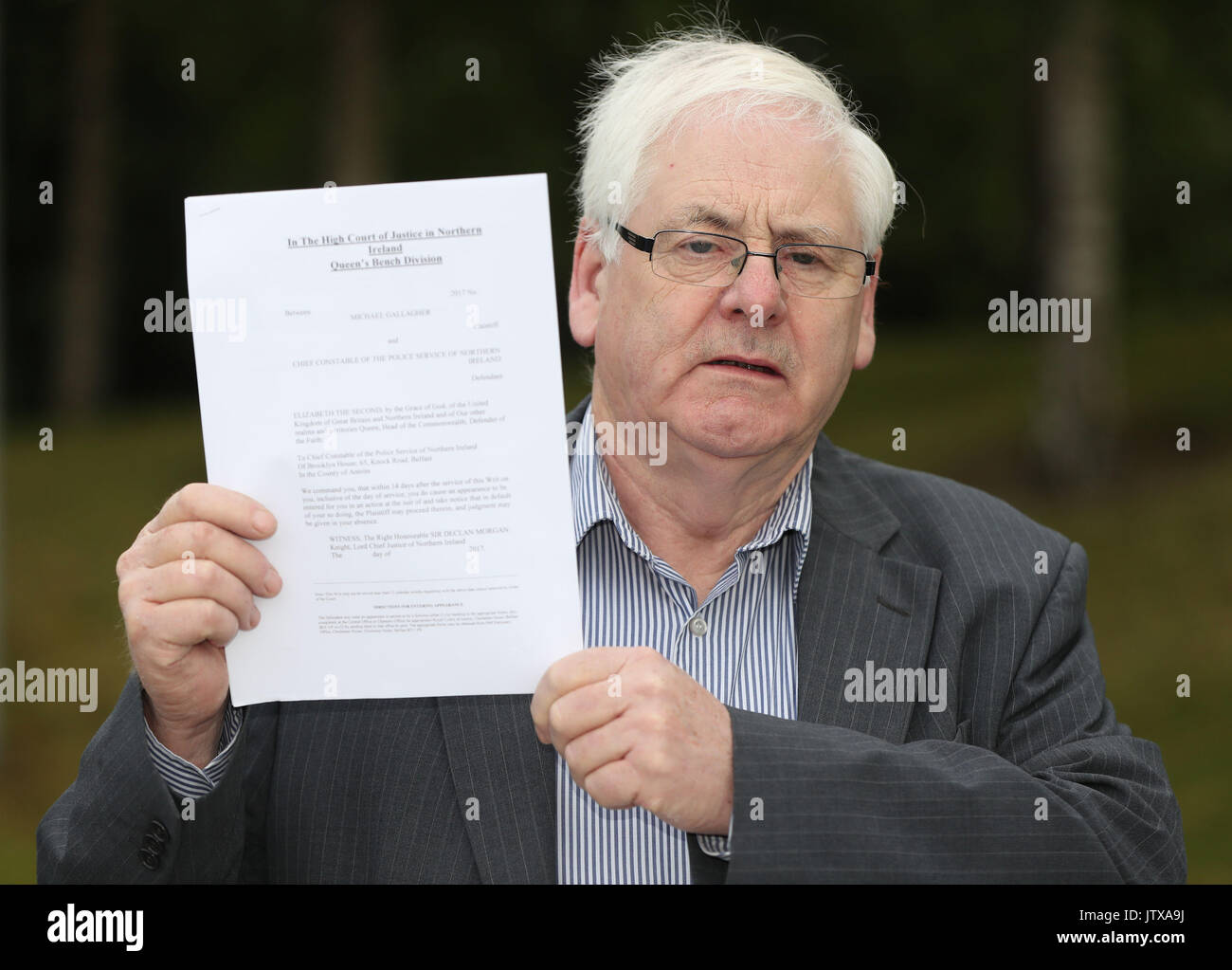 Michael Gallagher who lost his son Aiden in the Omagh bombing holds a ...