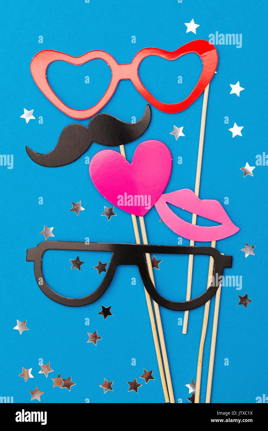 Party background with funny props on a blue background. Wedding party ...