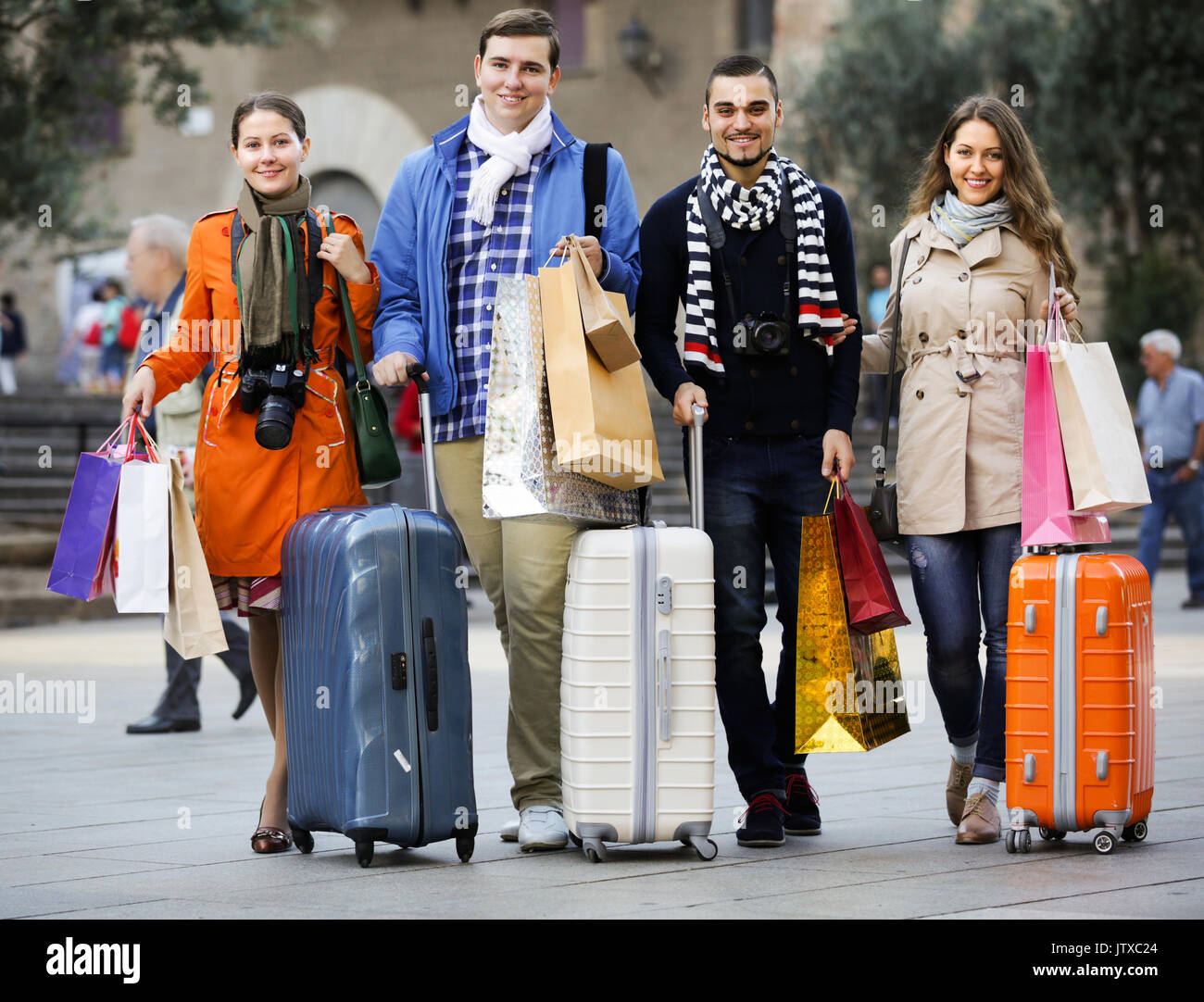 Young couples travelling with luggage hi-res stock photography and ...