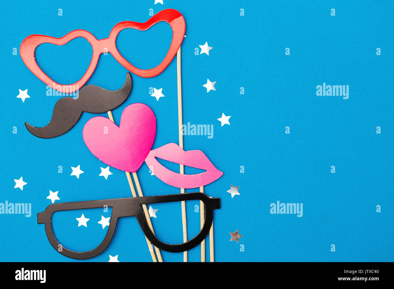 Party background with funny props on a blue background. Wedding party ...