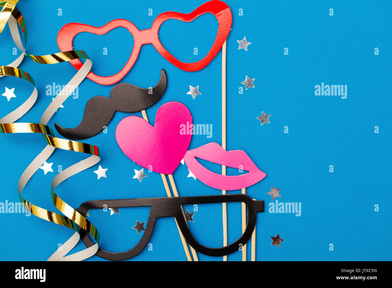 Party background with funny props on a blue background. Wedding party ...