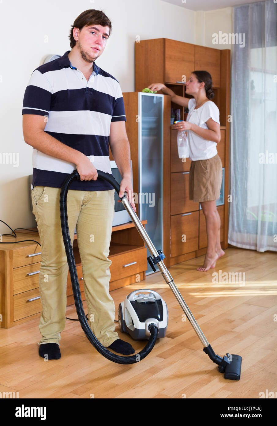 Family clean up house hi-res stock photography and images - Alamy